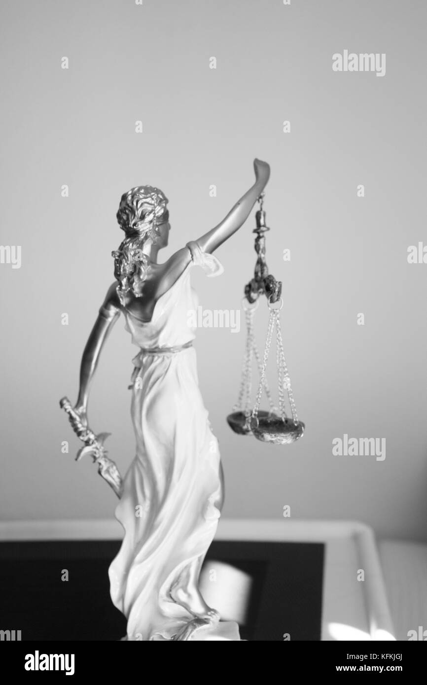 White female statue symbol of justice Themis. This figure has not ...