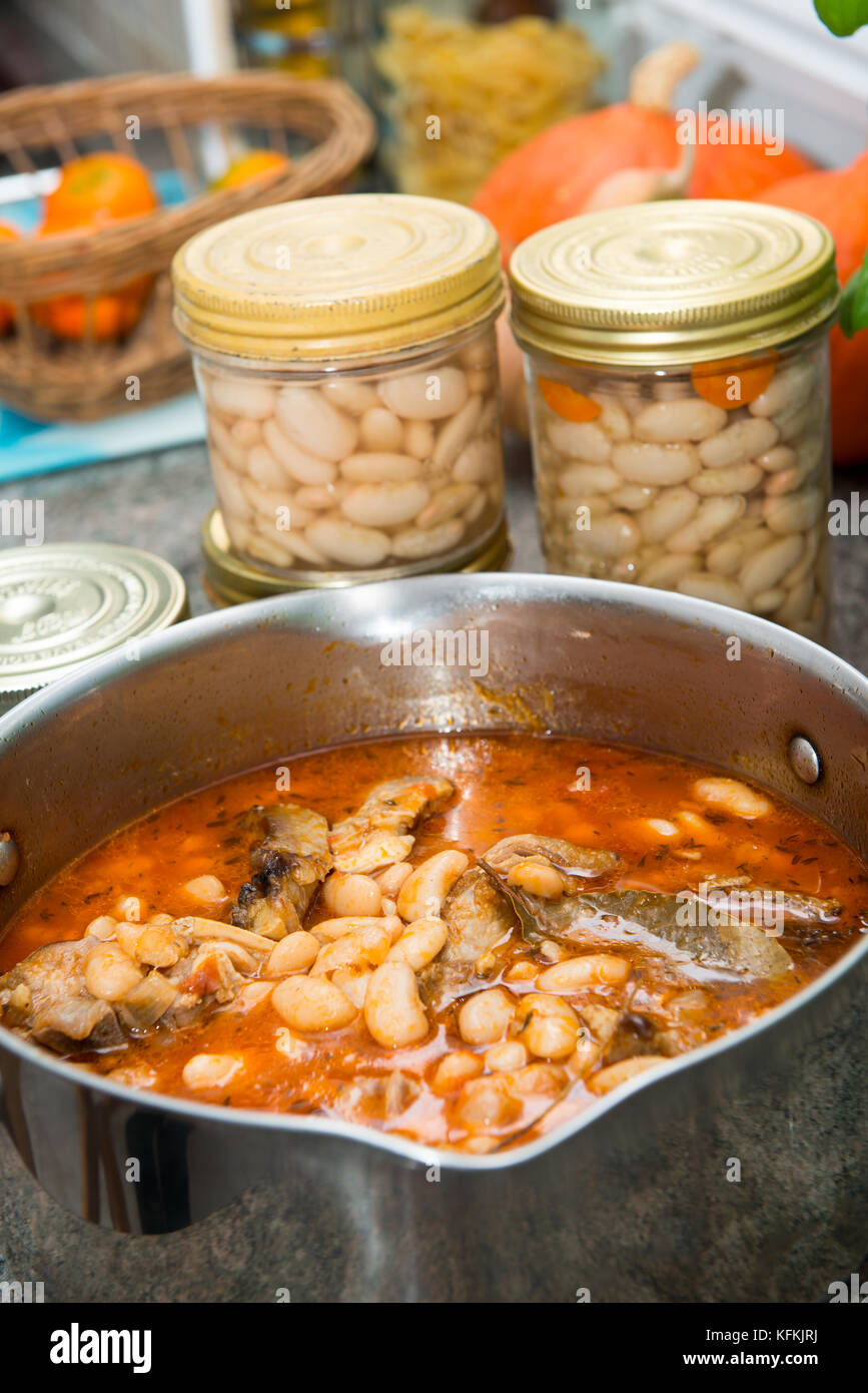 sheep stew with white beans in a saucepan Stock Photo - Alamy