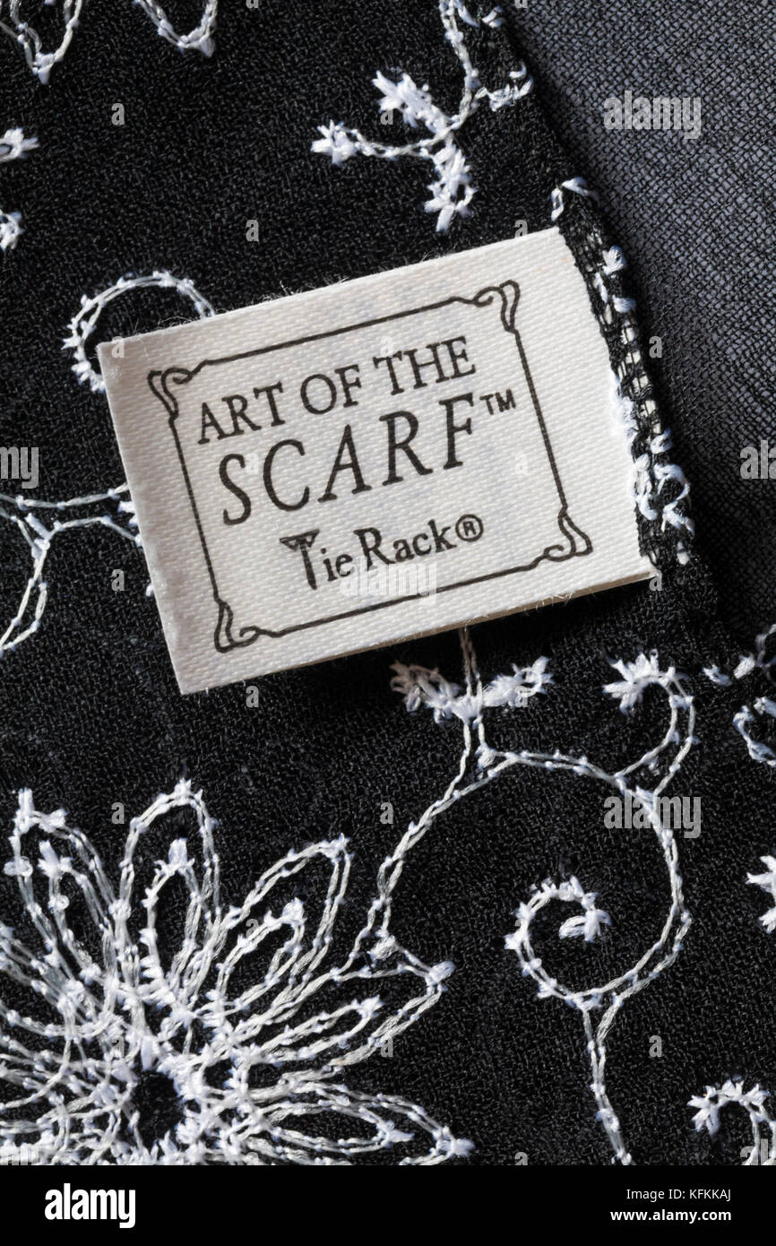 Art of the scarf Tie Rack Label in woman's black and white decorative ...