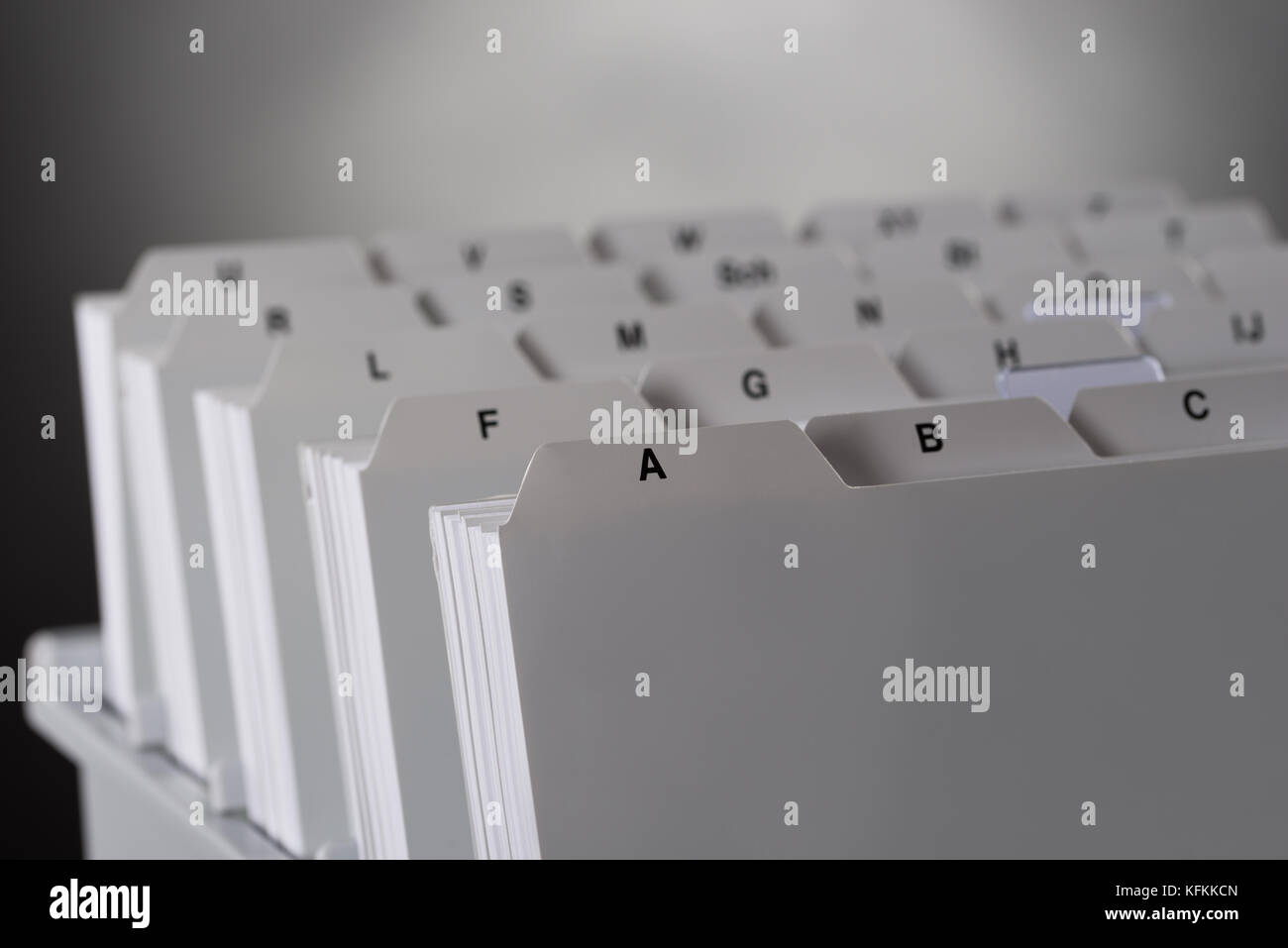 Photo of document archive over black background Stock Photo - Alamy