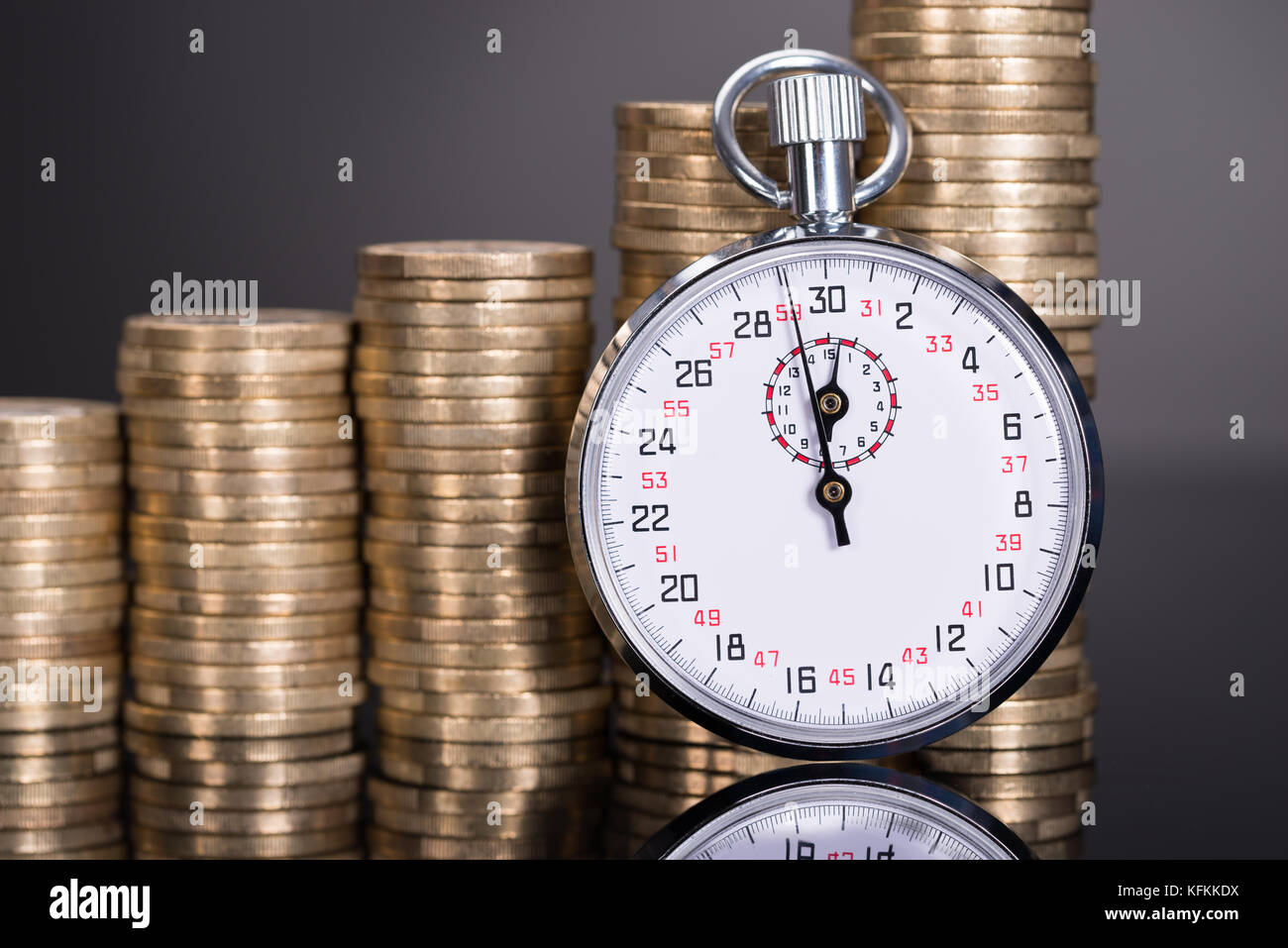 Time and money growth over black background Stock Photo - Alamy
