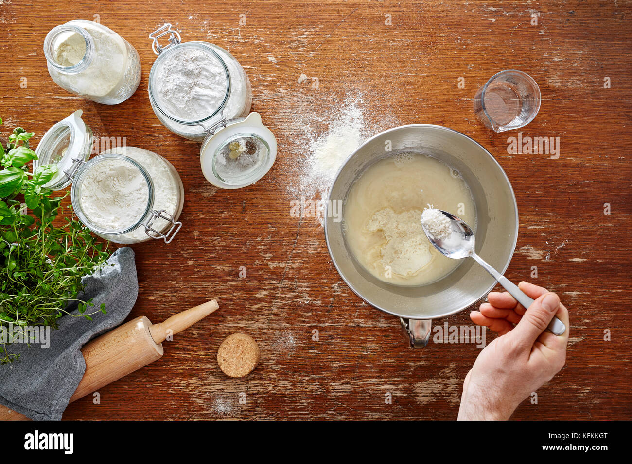 Mixing ingredients baking adding flour hi-res stock photography and ...