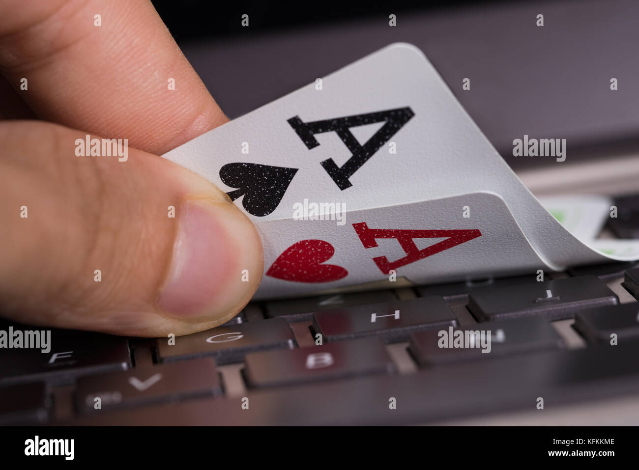 Aces on computer keyboard. Online gambling concept Stock Photo - Alamy