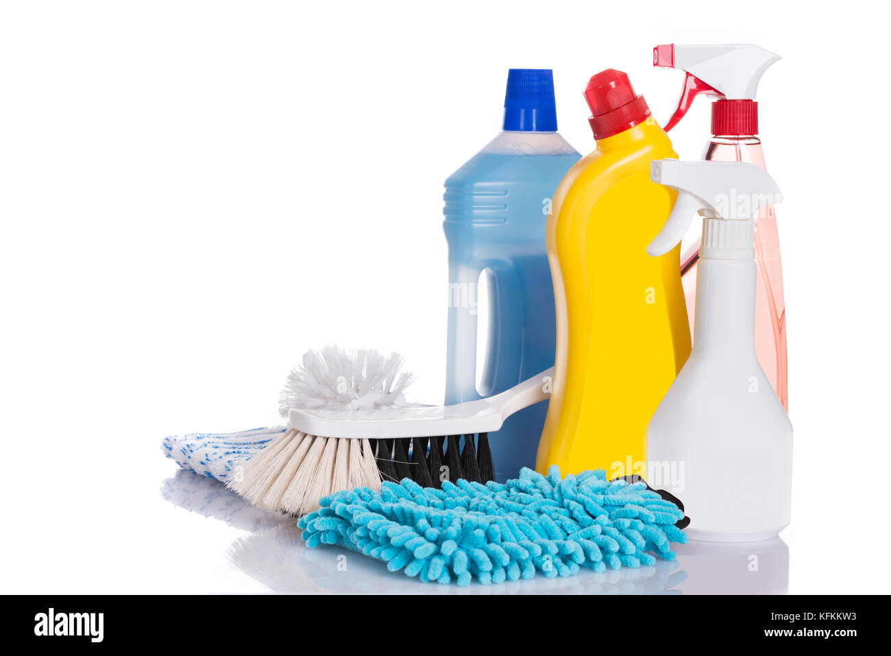 Cleaning liquids and supplies. Isolated on white Stock Photo - Alamy