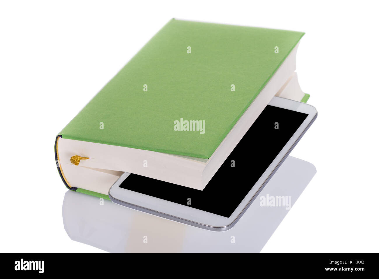 Tablet inside book. Isolated on white background Stock Photo - Alamy