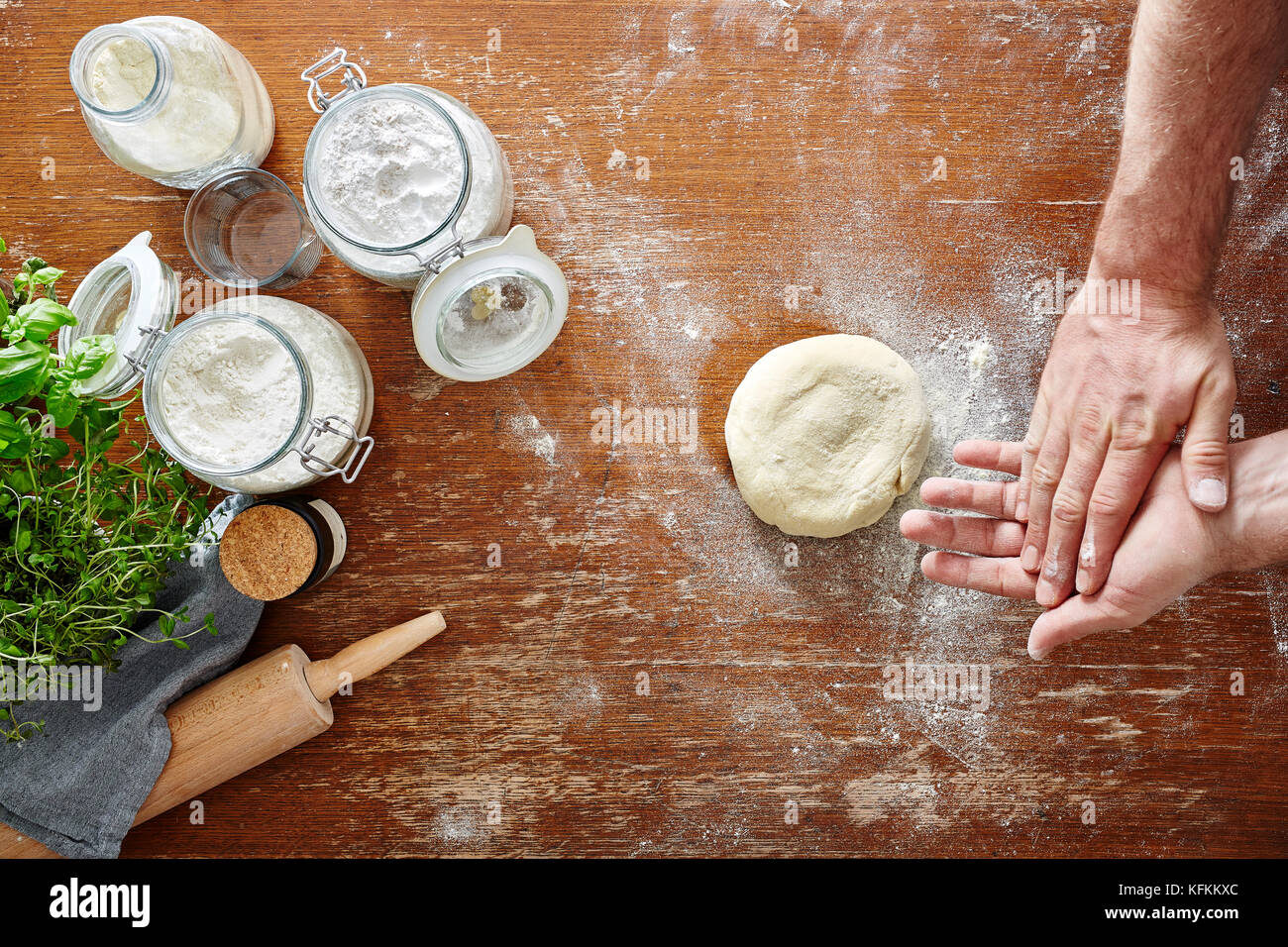 flour and hands dough on wooden table baking scene Stock Photo - Alamy
