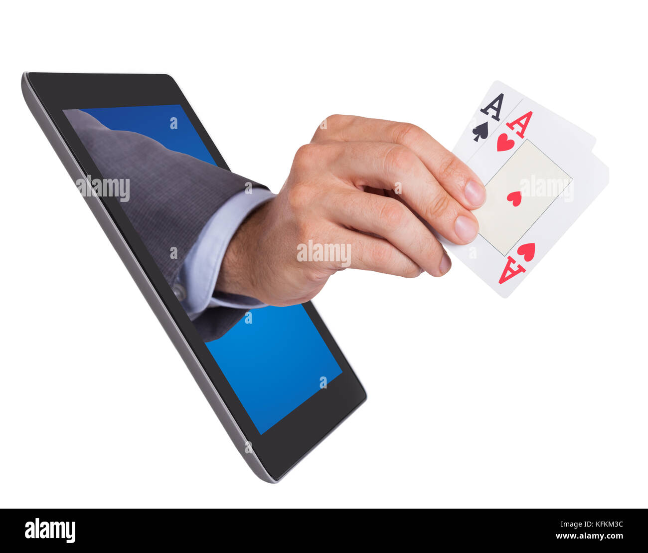 Businessman's hand holding ace cards while emerging from digital tablet ...