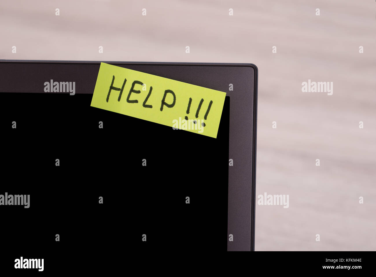 Closeup of Help !!! sticky note message on laptop screen Stock Photo ...