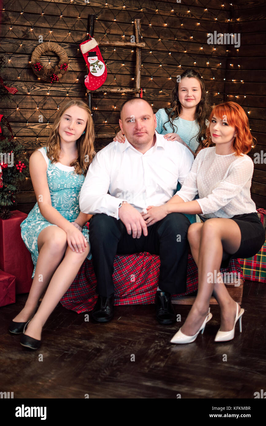 Happy family with Christmas presents near the Christmas tree Stock ...