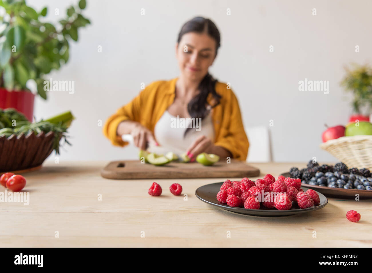 woman cutting fresh apple Stock Photo - Alamy