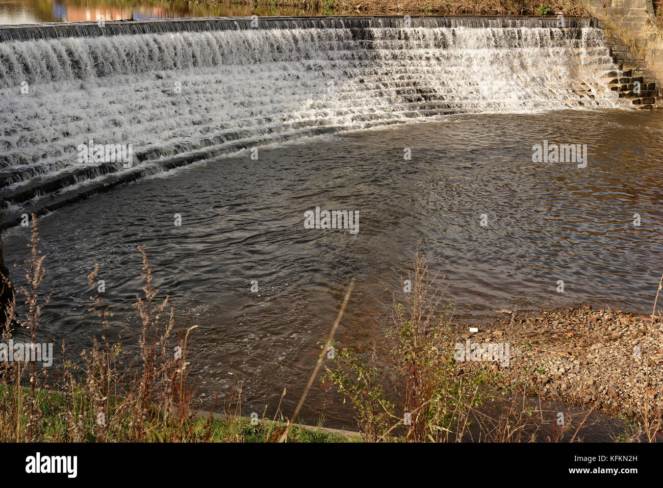 Weir on river irwell at radcliffe lancashire uk Stock Photo - Alamy