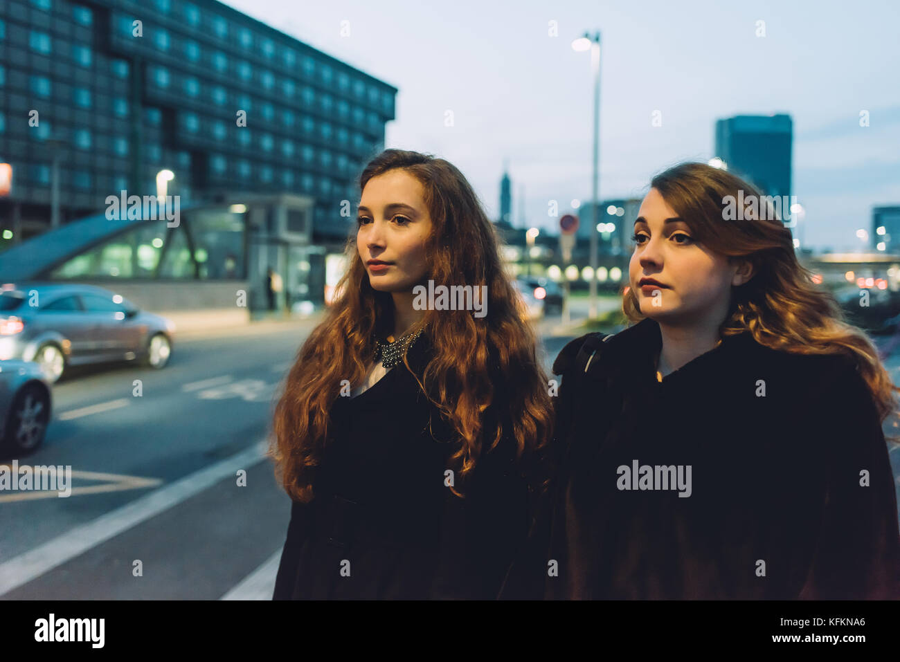 two young women friends walking outdoor sunset - attitude, independence ...
