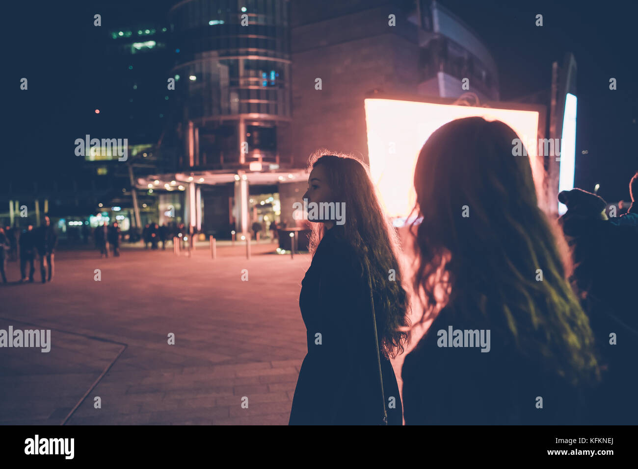Friends Walking Together At Night