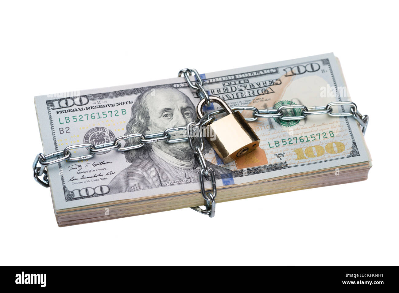 Closeup of metallic chain and padlock around dollar bundle isolated ...