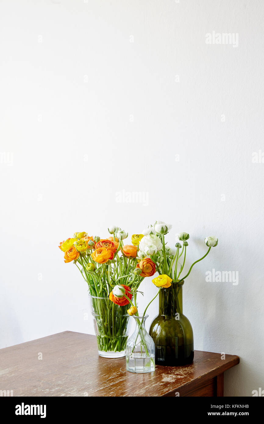 vintage table with flower decoration Stock Photo - Alamy