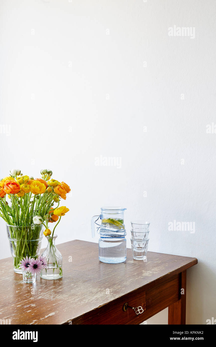 home made lemonade and flower decoration on vintage table Stock Photo ...