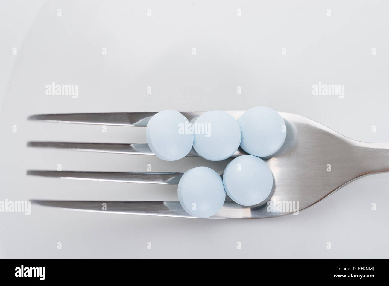Pills in plate hi-res stock photography and images - Alamy