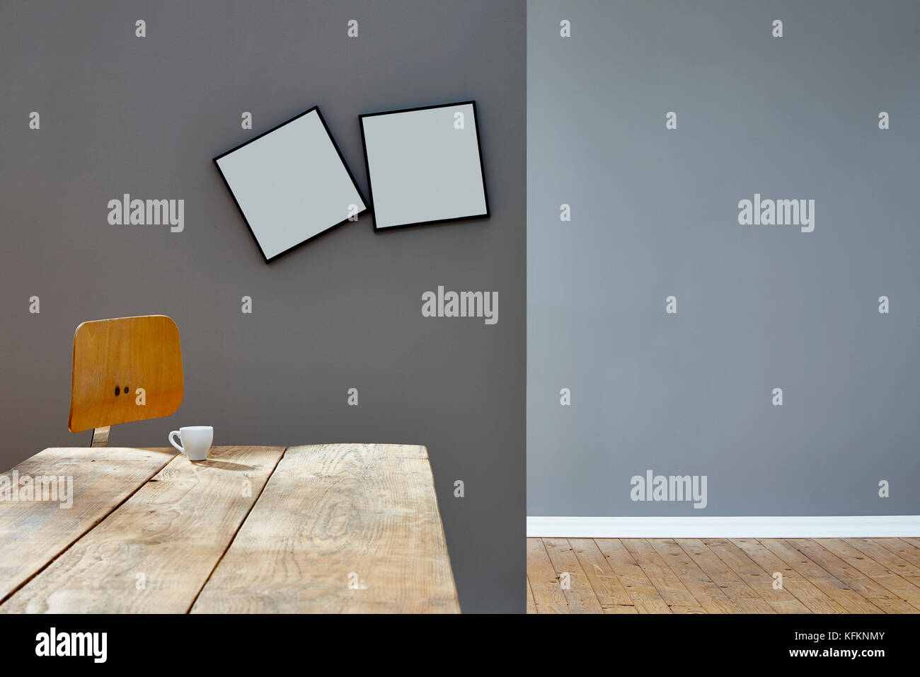two crooked frames in empty vintage loft Stock Photo - Alamy