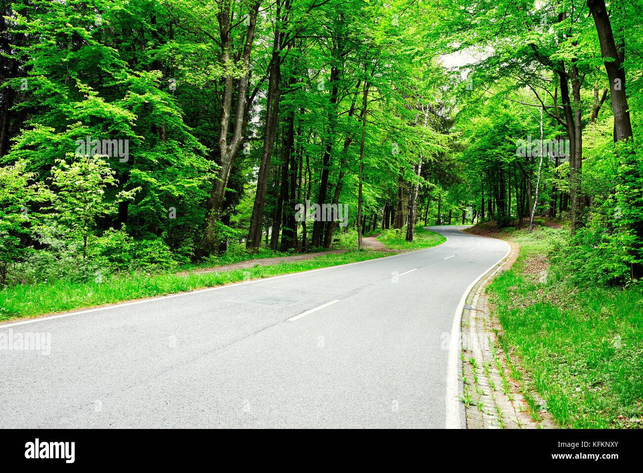 Road going uphill hi-res stock photography and images - Alamy