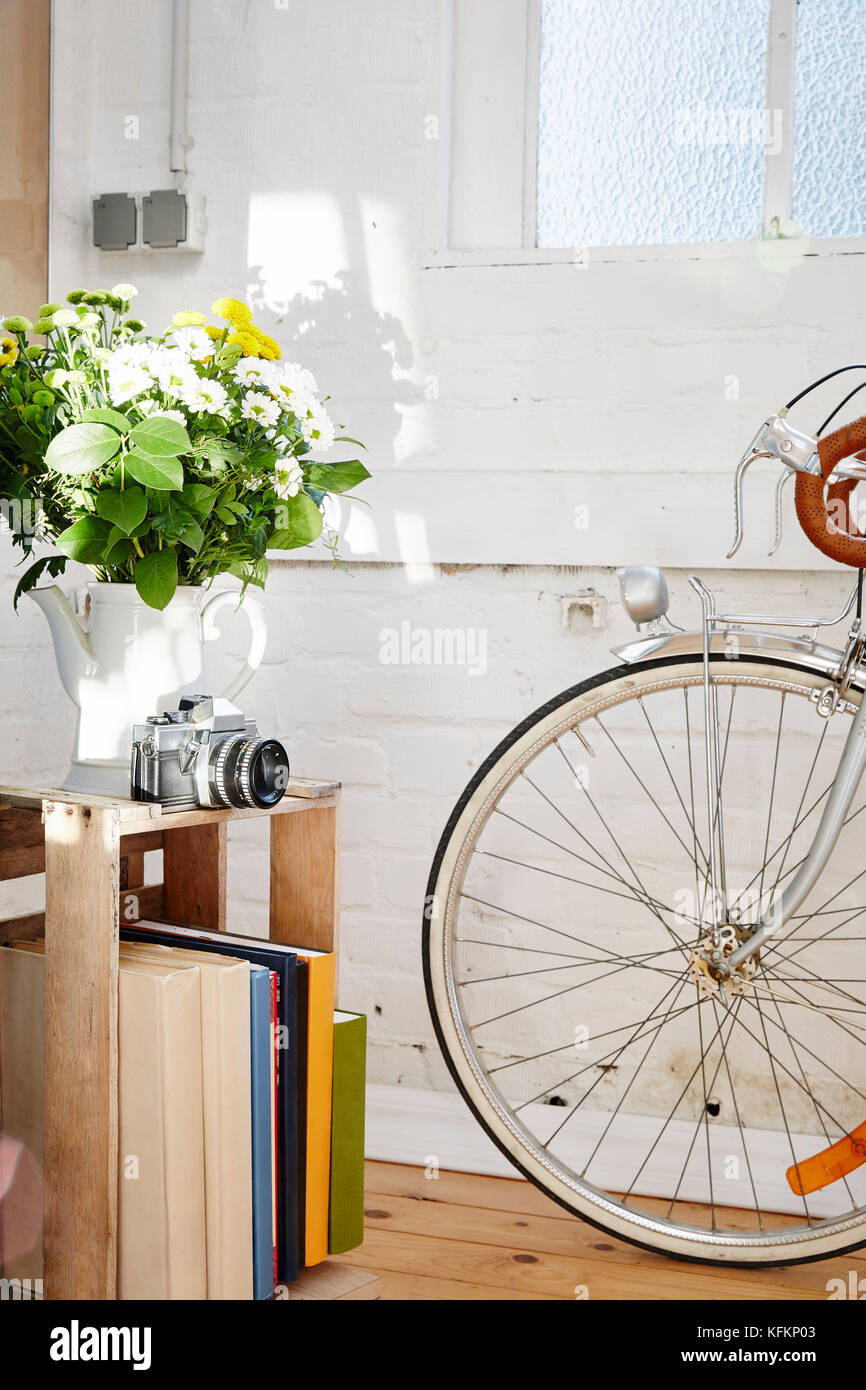 vintage still life flowers camera bike Stock Photo - Alamy
