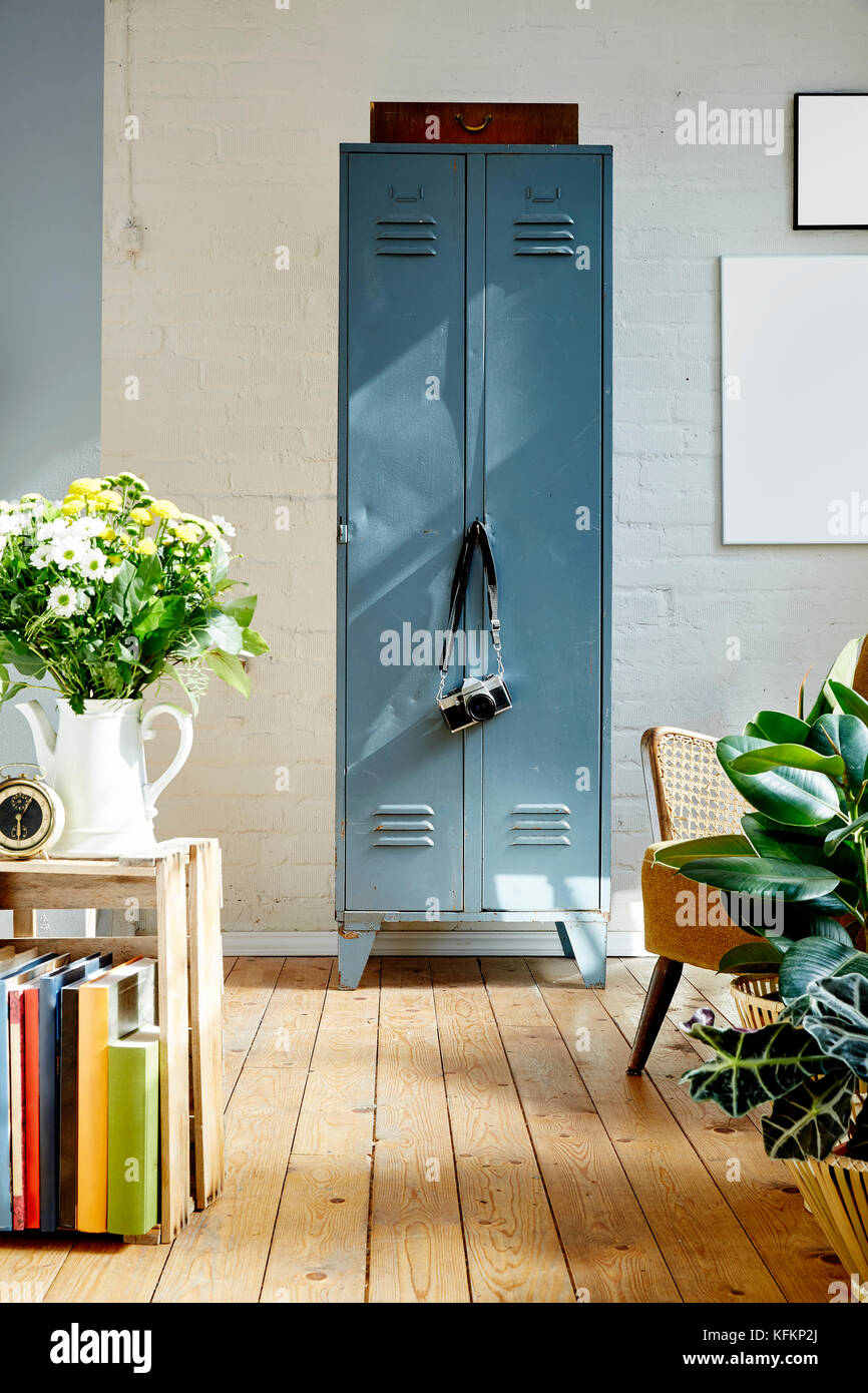 vivid vintage apartment metal locker plants and sun light Stock Photo ...