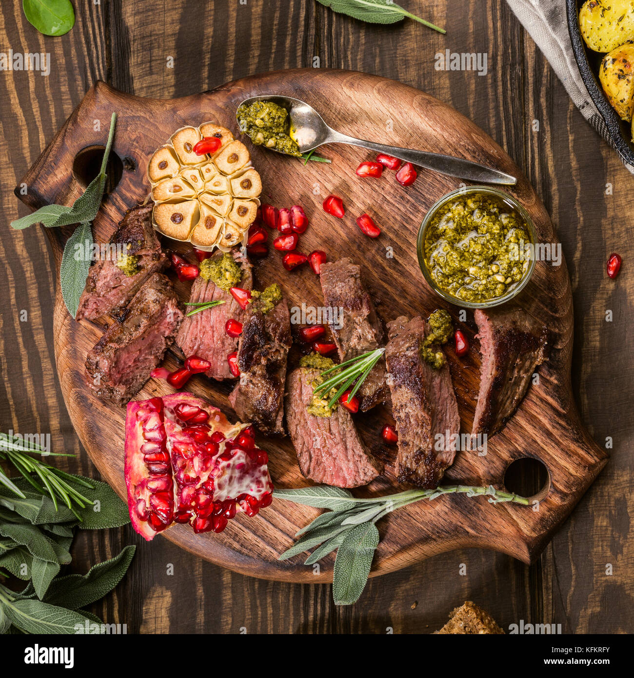Meat steak with green pesto Stock Photo - Alamy