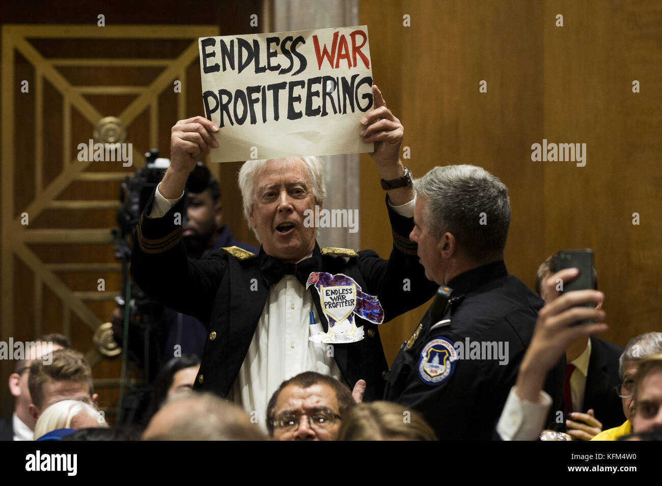 Washington, District Of Columbia, USA. 30th Oct, 2017. A protester ...