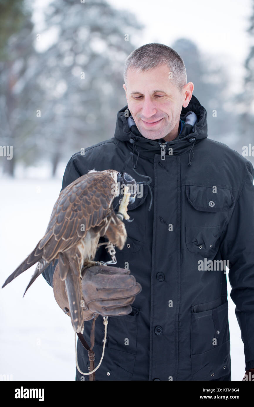 Man with a bird Stock Photo - Alamy