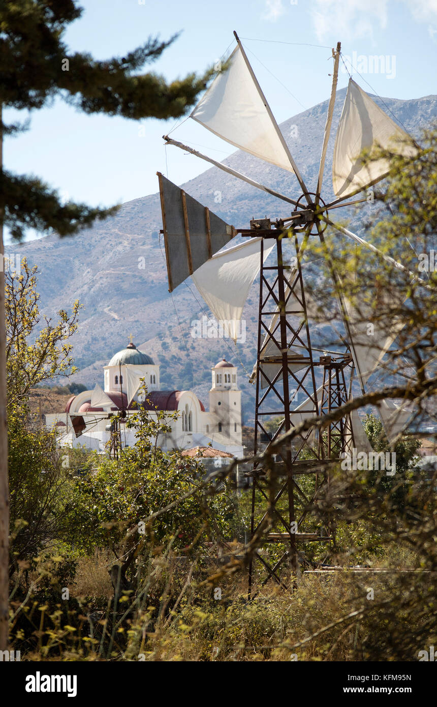 Windmill and church at Agios Georgios on the Lasithi plateau, Crete ...