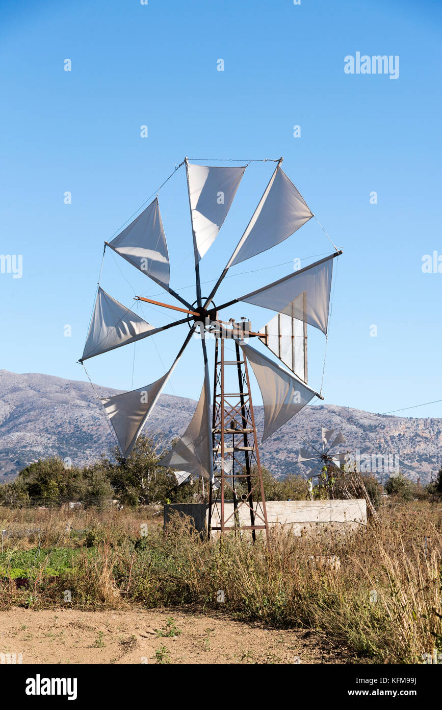 Windmill pumping water on farmland at Agios Georgios on the Lasithi ...