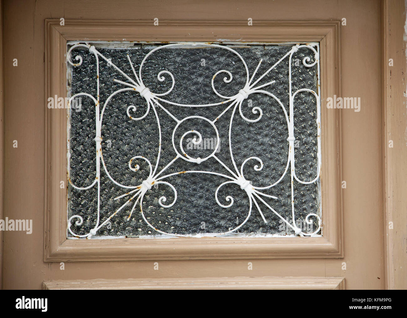 Detail of front door, decorative wrought iron pattern, art deco style ...