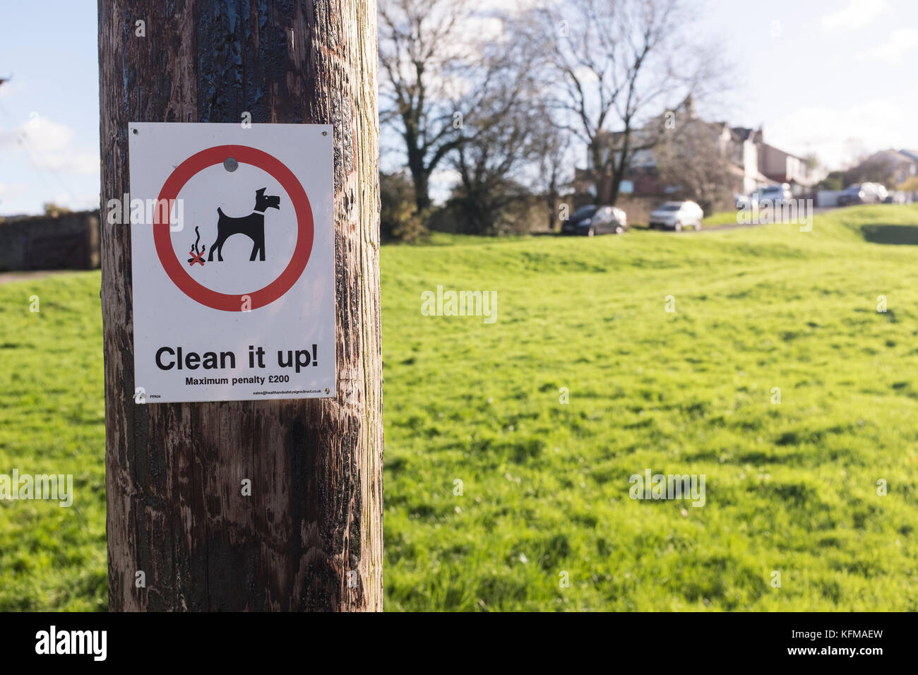 Clean it up. Dog fouling sign Stock Photo - Alamy