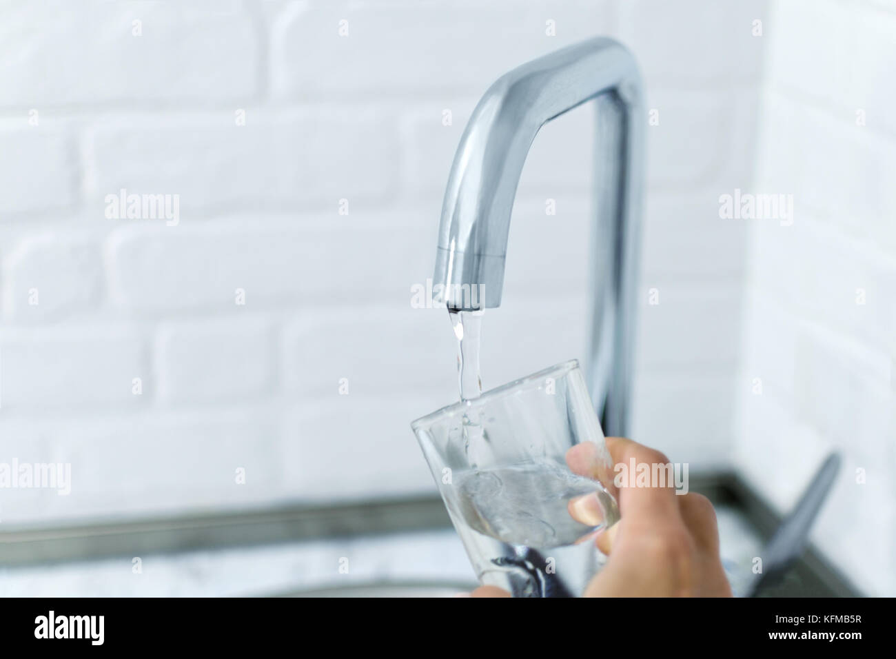 Faucet sink hand glass water hi-res stock photography and images - Alamy