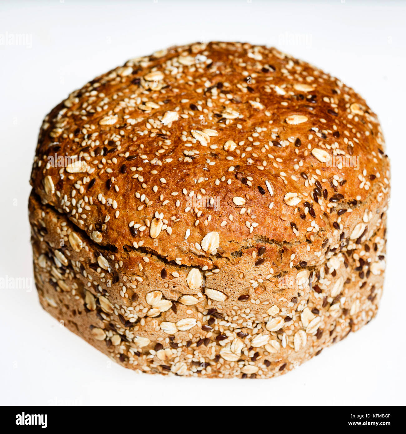 Healthy rustic German bread with seeds, on a clear white background ...
