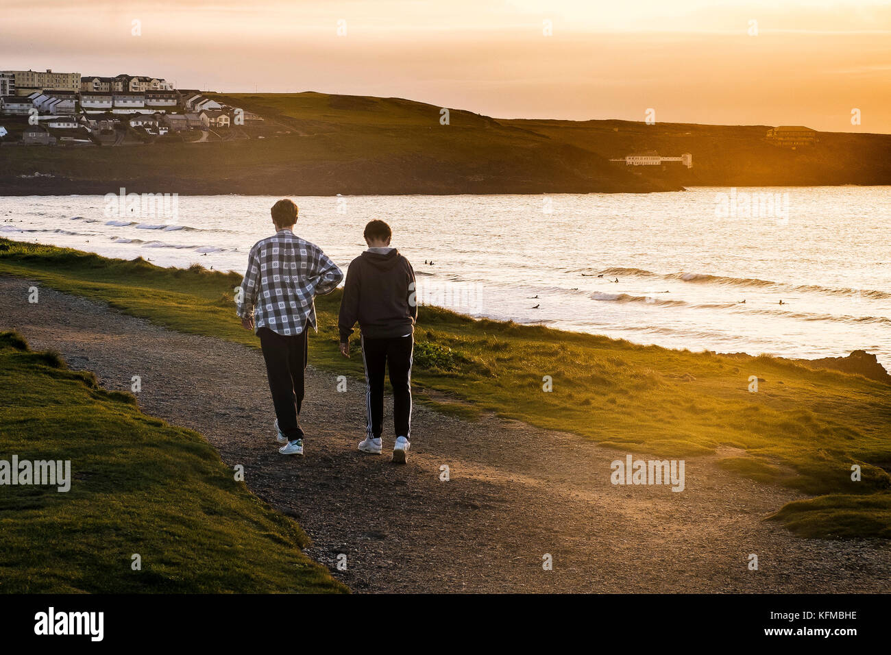 Two boys walk along path hi-res stock photography and images - Alamy