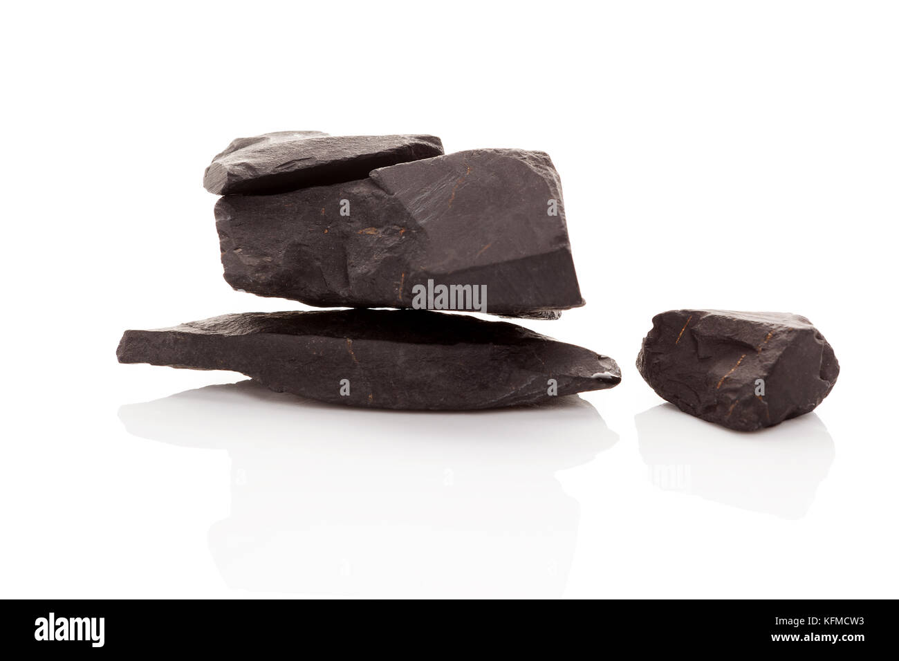 Shungite stones isolated on white background. Alternative medicine ...