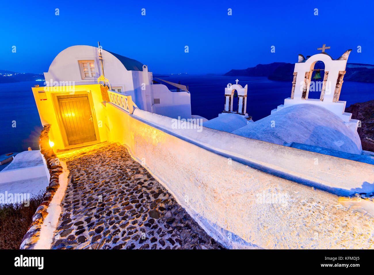 Santorini, Greece. Oia, white village with cobbled narrow paths, famous ...