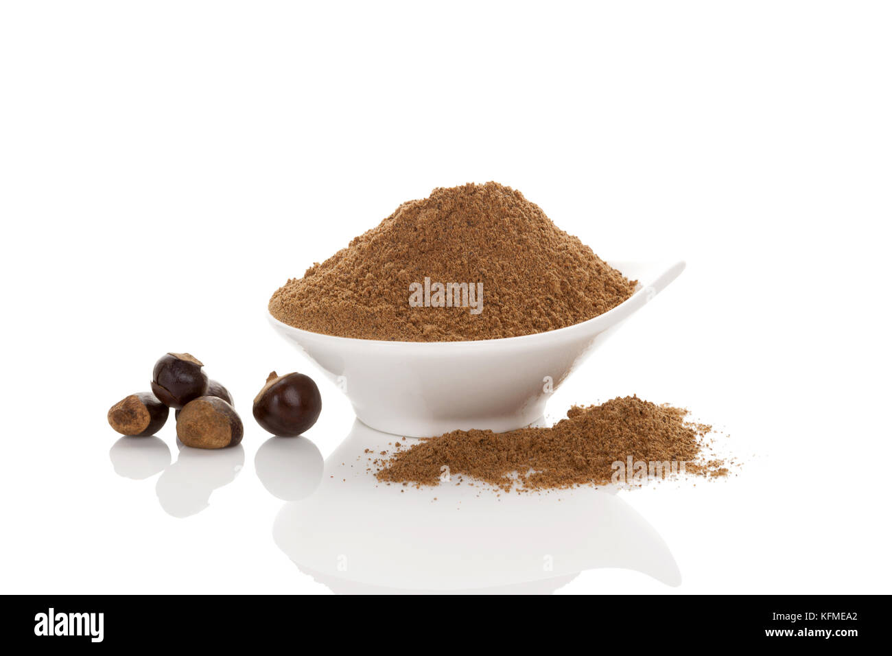 Guarana seeds and powder in bowl. Isolated on white background ...