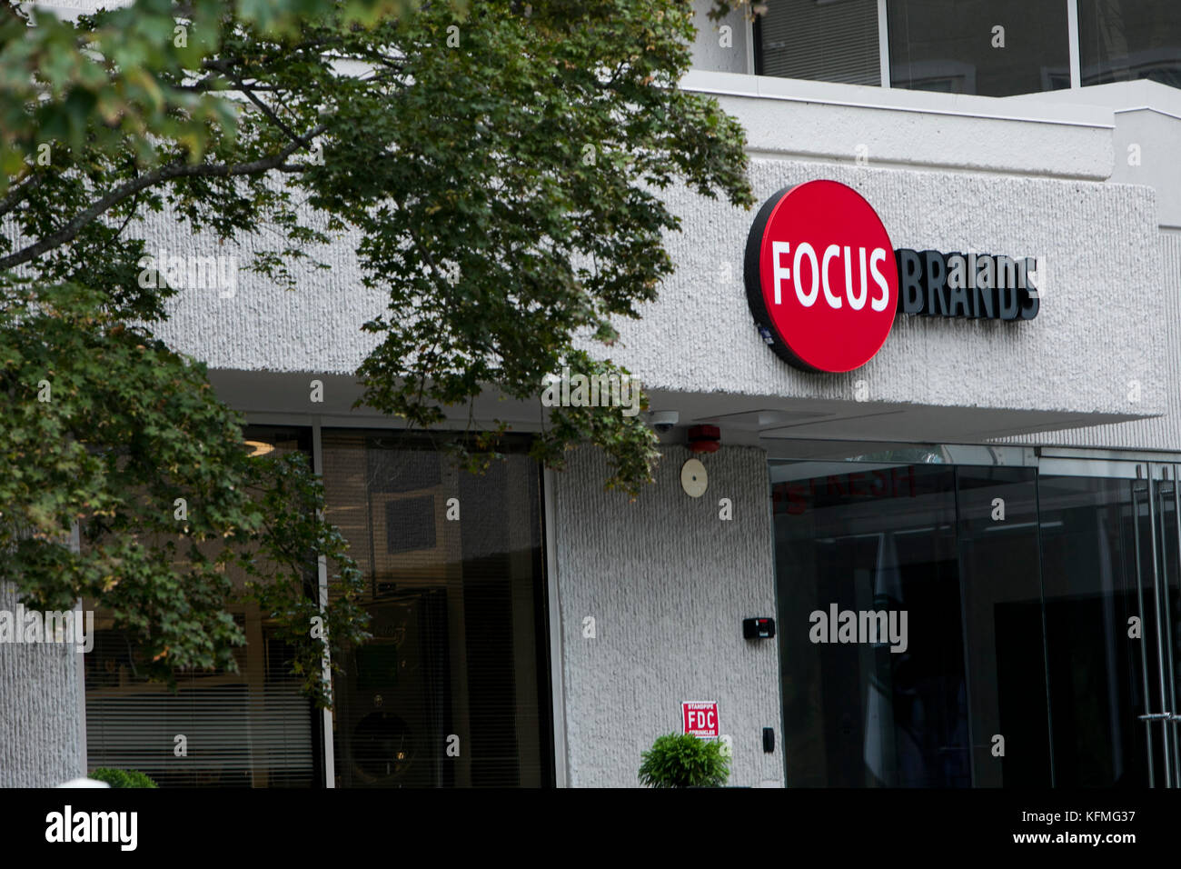A logo sign outside the headquarters of Focus Brands in Atlanta ...