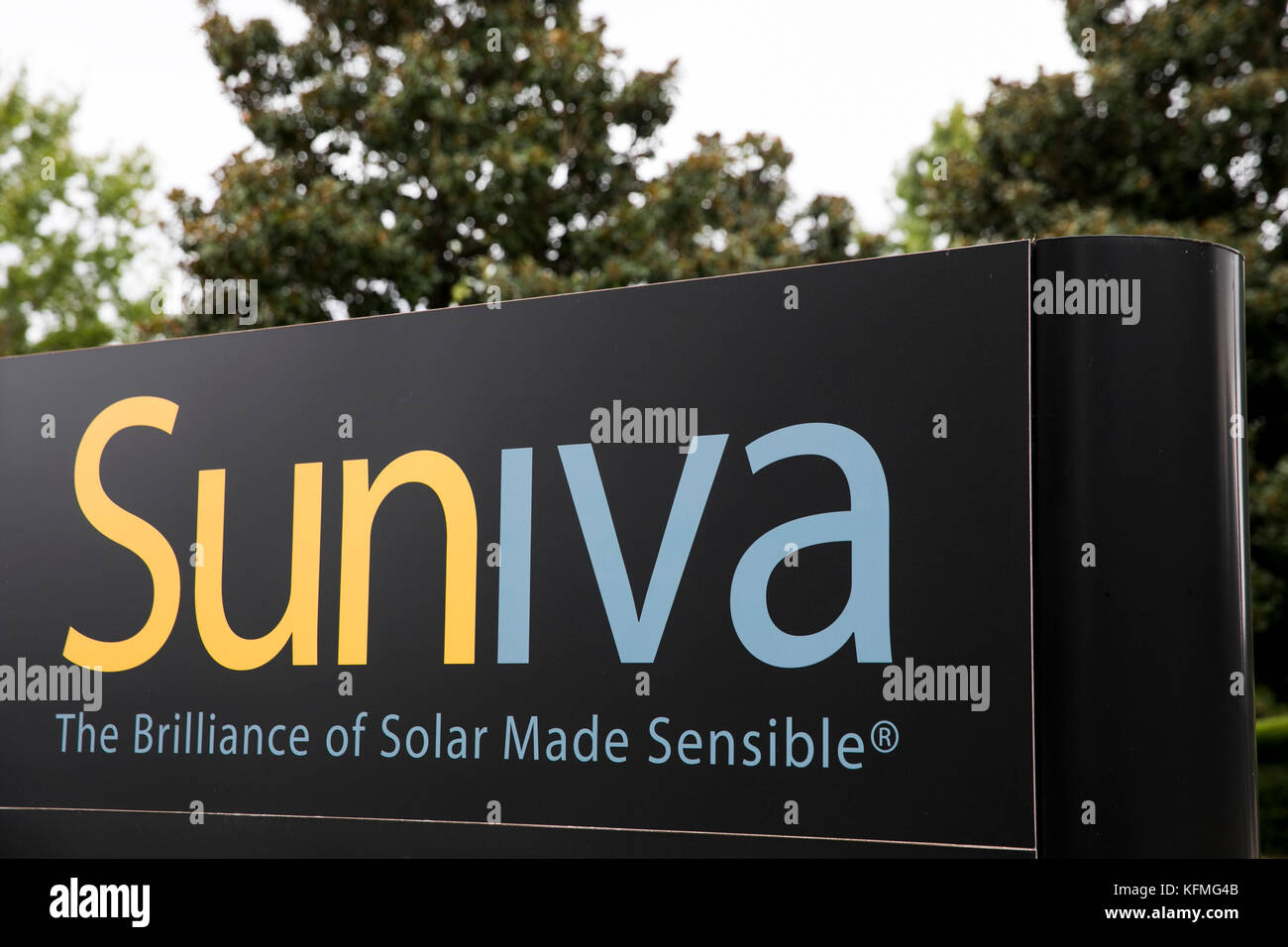 A logo sign outside of the headquarters of Suniva in Norcross, Georgia ...