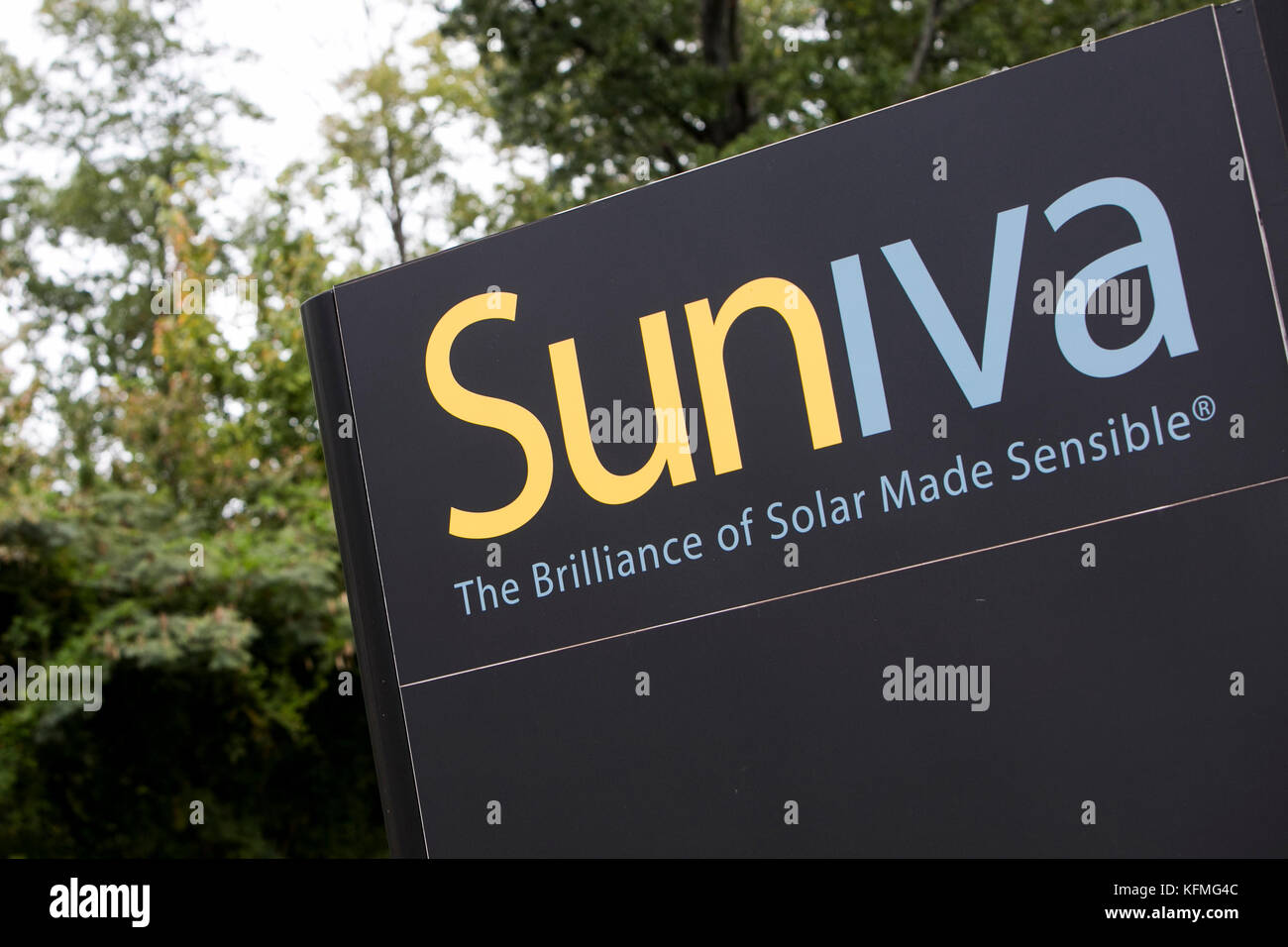 A logo sign outside of the headquarters of Suniva in Norcross, Georgia ...