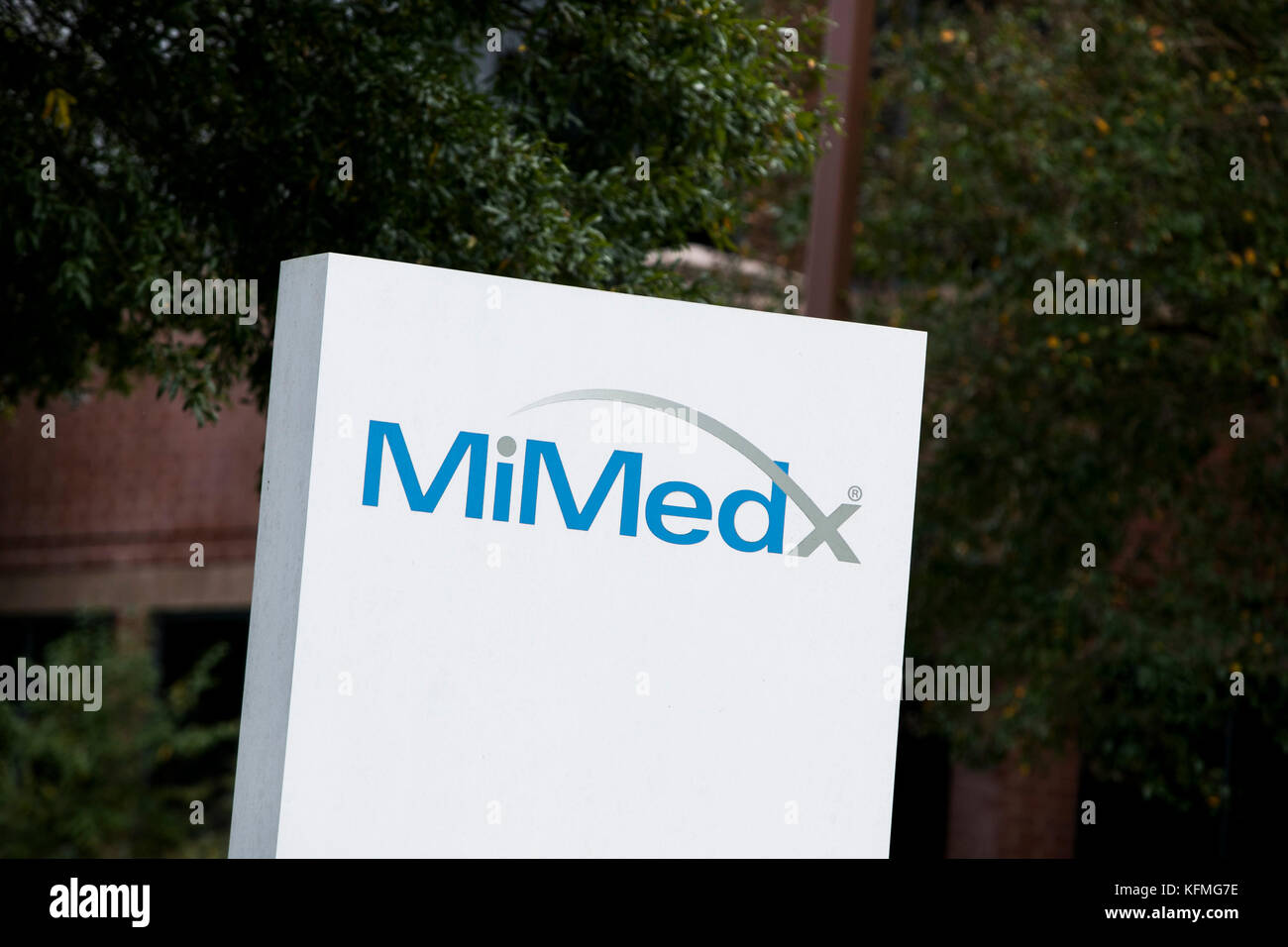 A logo sign outside of the headquarters of MiMedx in Marietta, Georgia ...