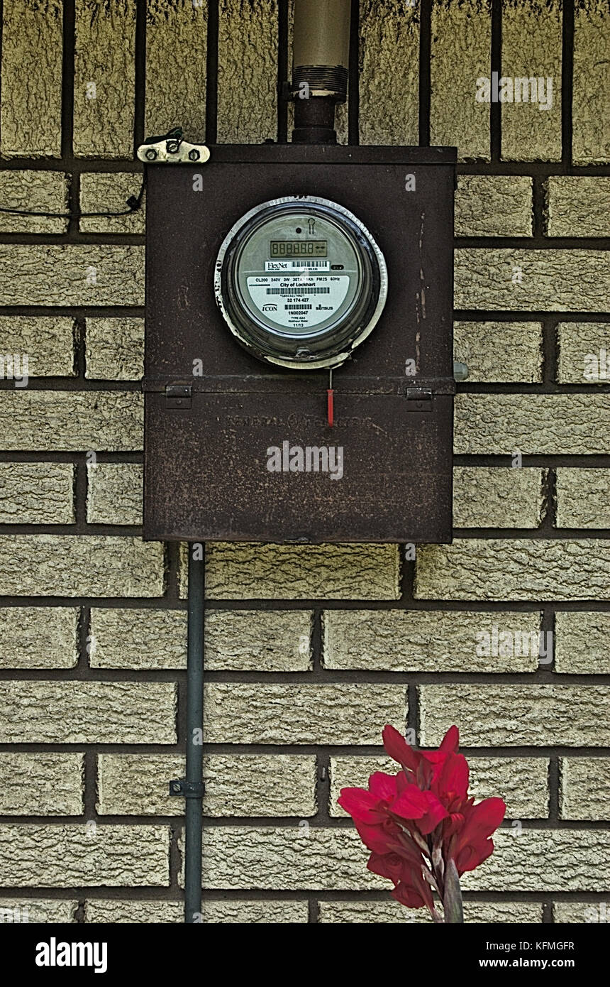 Smart meter on a brick wall Stock Photo - Alamy