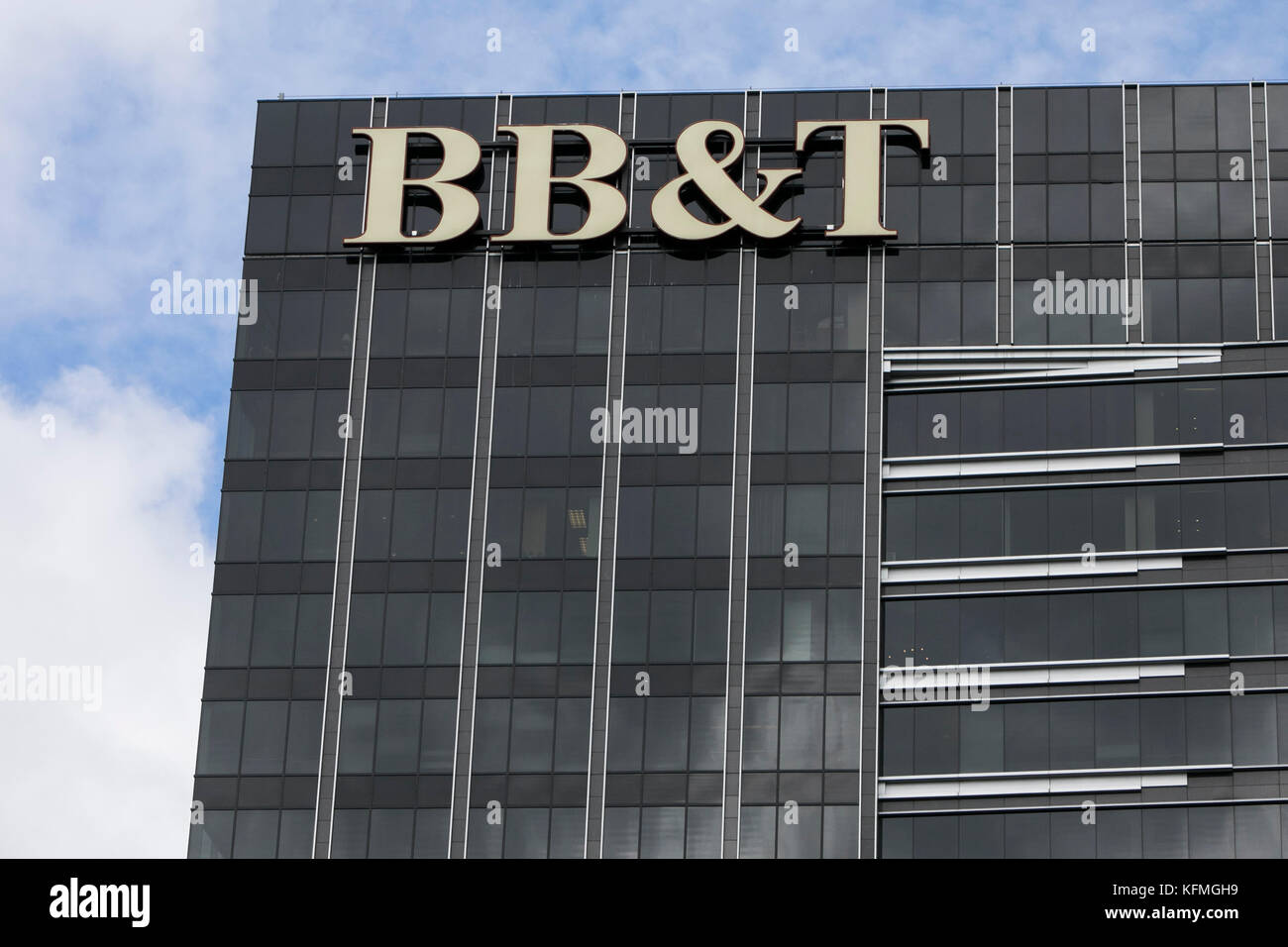 A logo sign outside of a facility occupied by the BB&T Corporation in ...