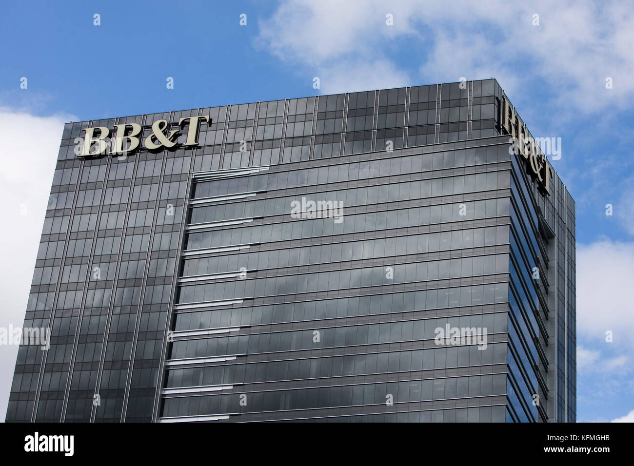 A logo sign outside of a facility occupied by the BB&T Corporation in ...