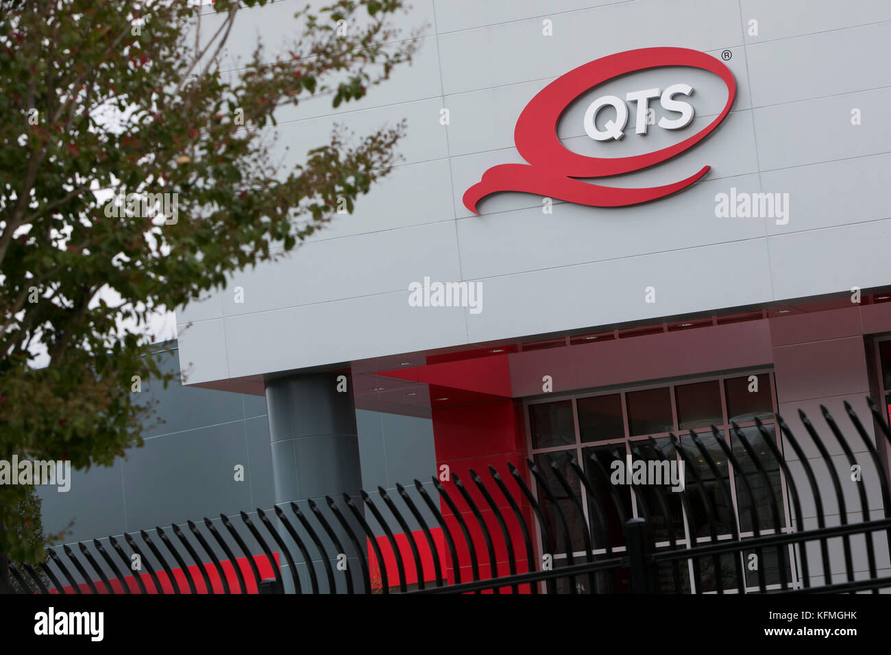 A logo sign outside of a data center operated by QTS Realty Trust, Inc ...