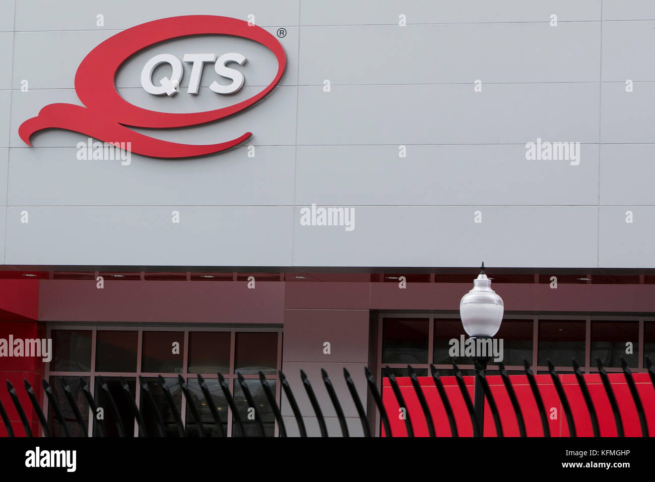 A logo sign outside of a data center operated by QTS Realty Trust, Inc ...