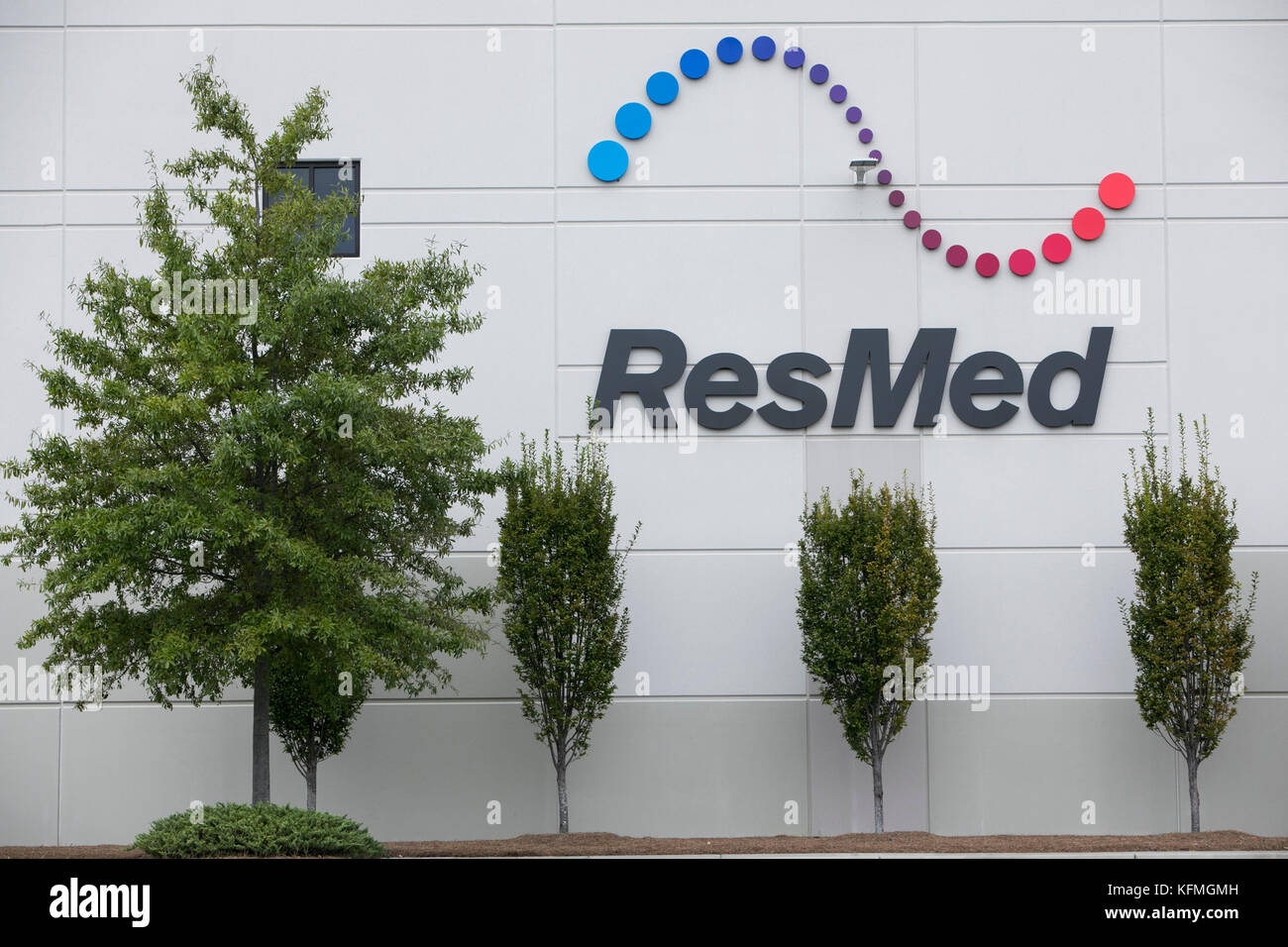 A logo sign outside of a facility occupied by ResMed in Lithia Springs ...