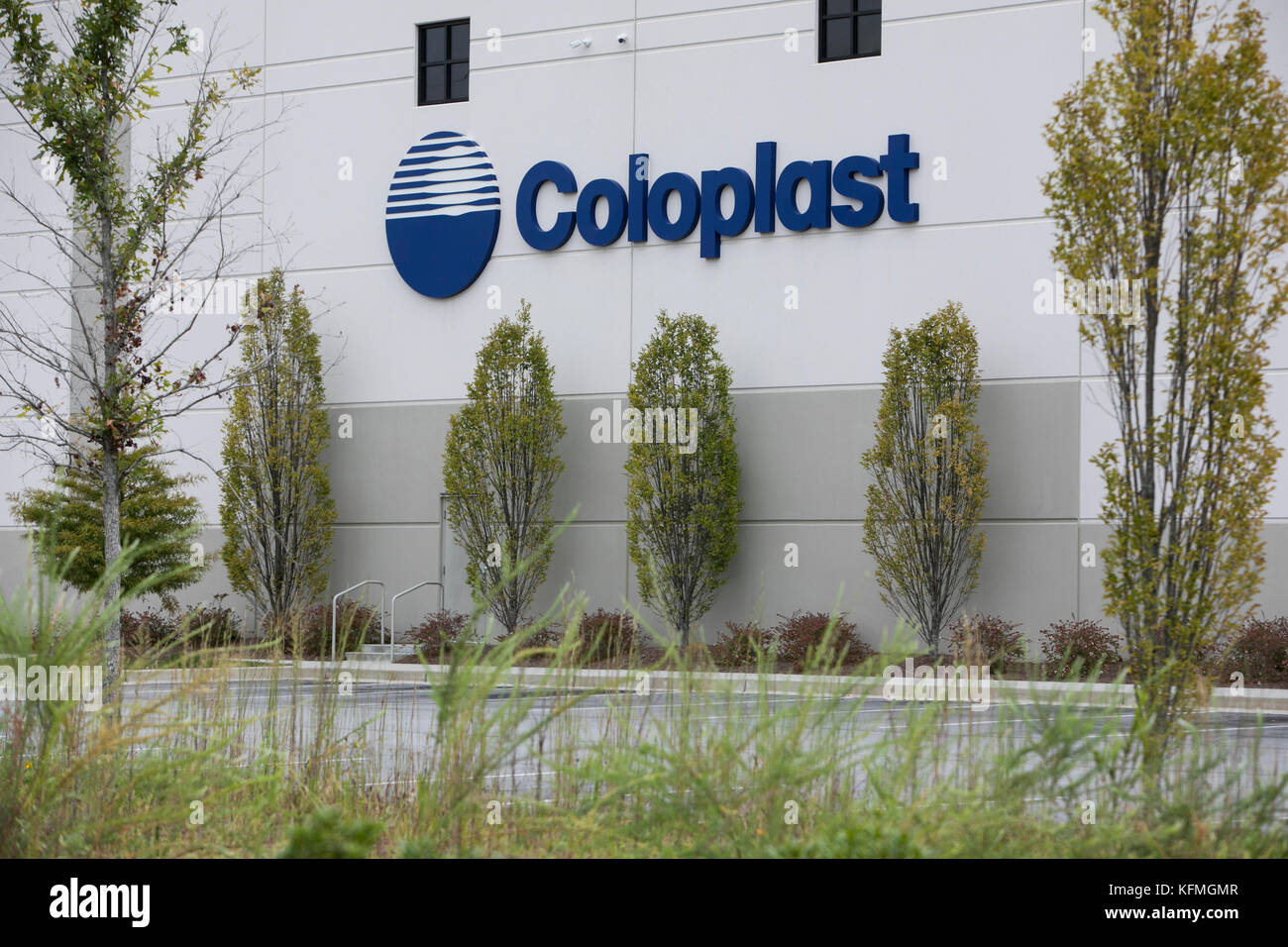 A logo sign outside of a facility occupied by Coloplast in Lithia ...
