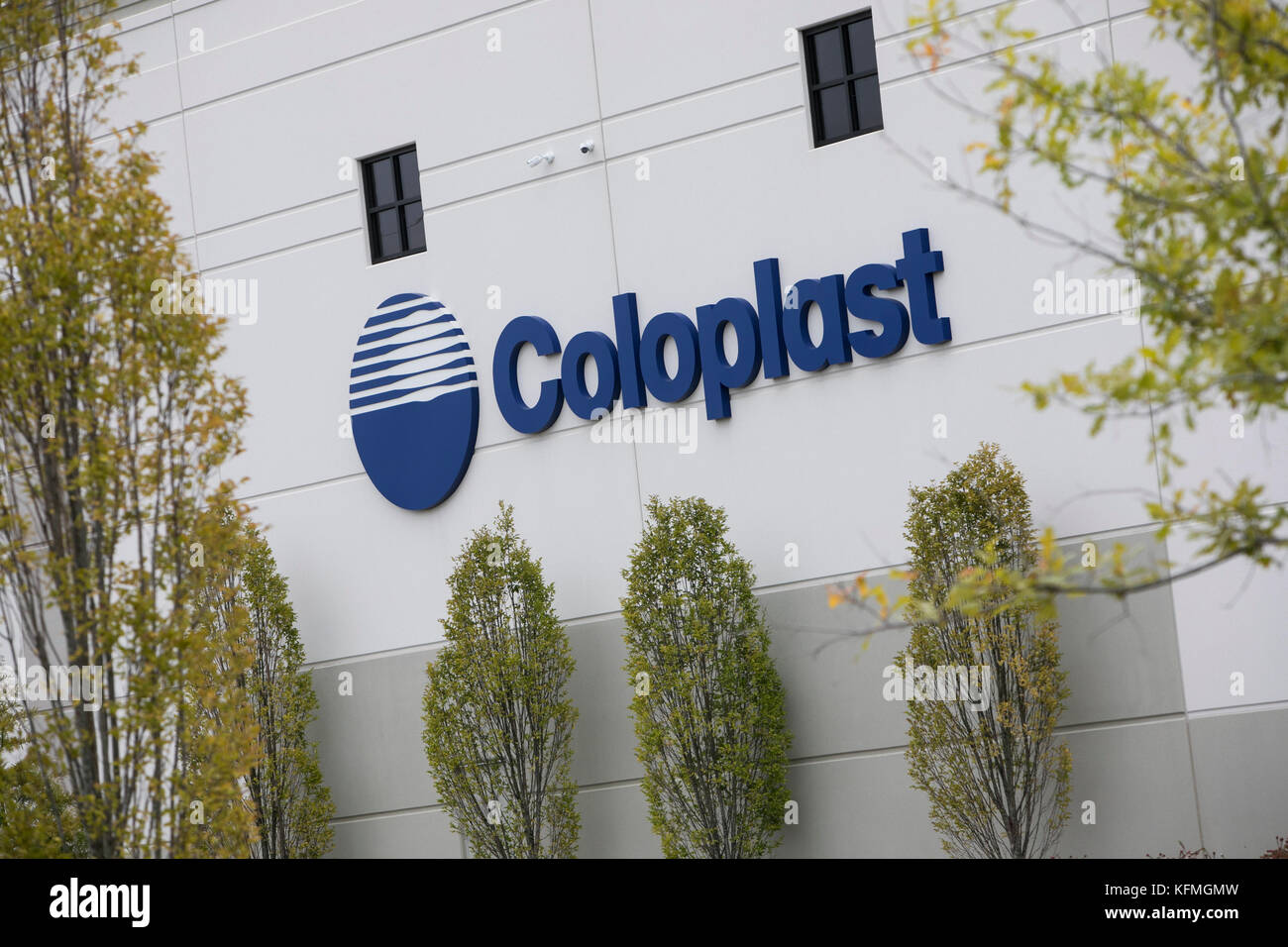 A logo sign outside of a facility occupied by Coloplast in Lithia ...